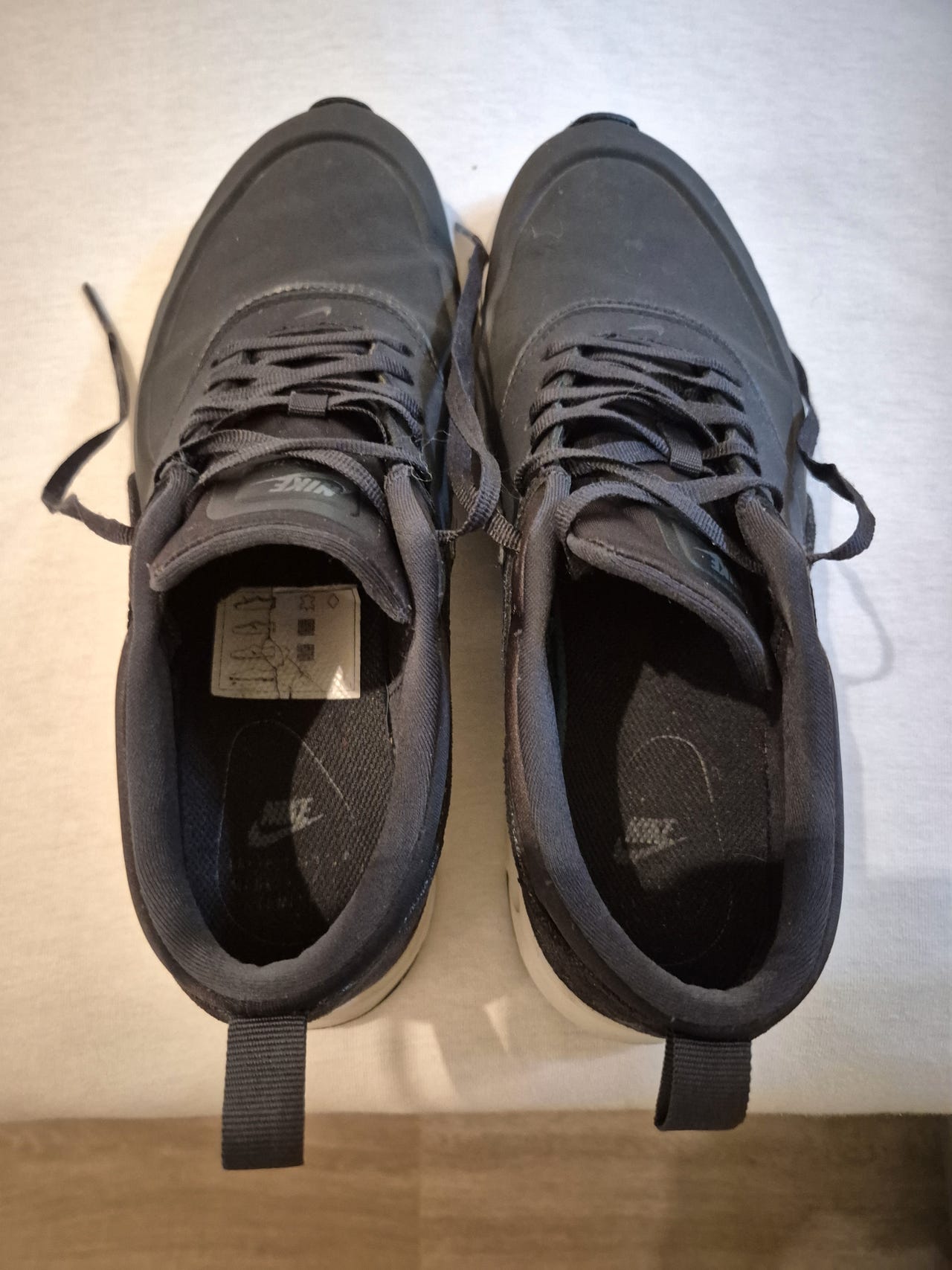 Sorte joggesko i skinn fra Nike. | FINN-torget