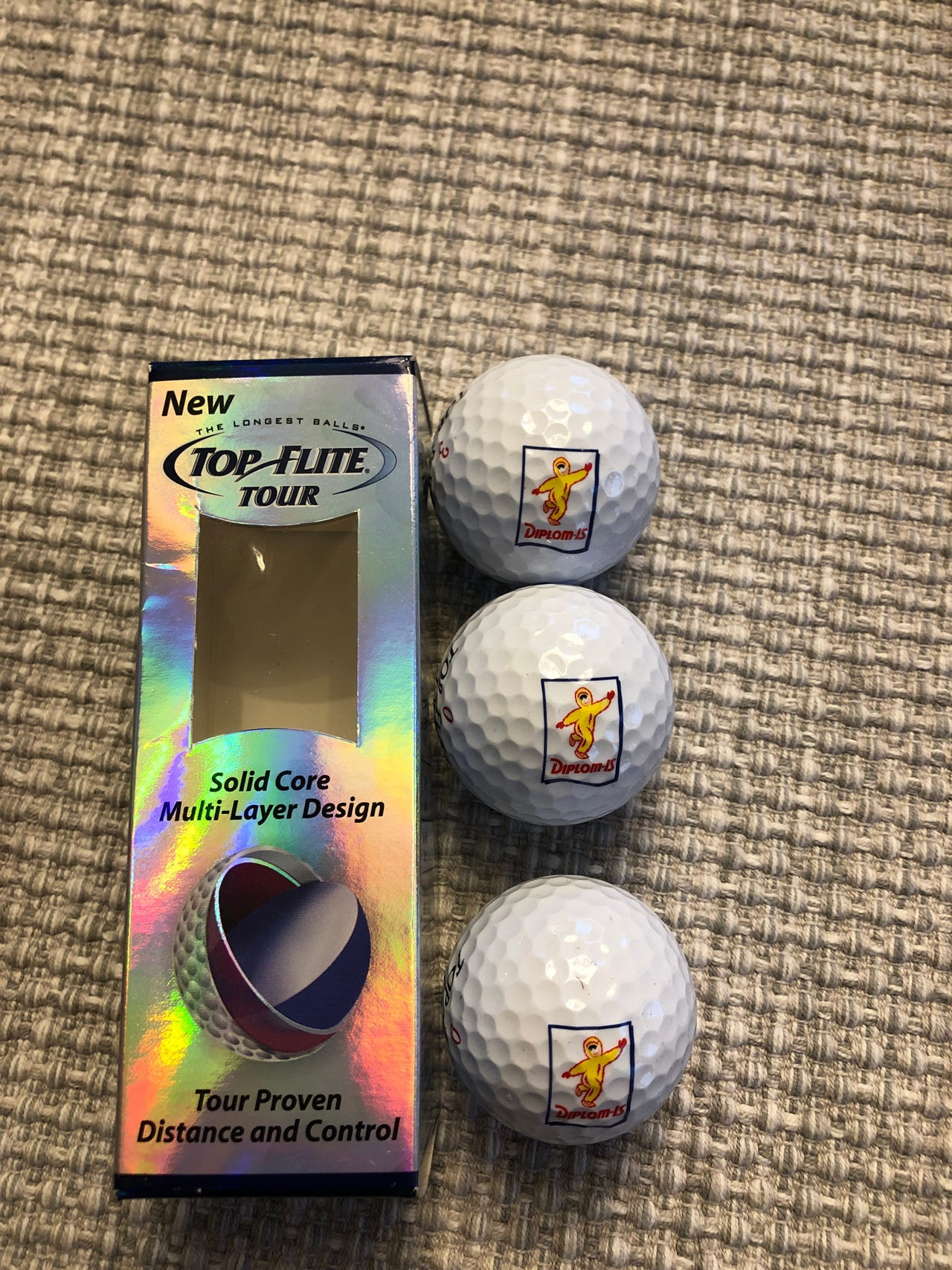 Golfballer med Diplom-is reklame. | FINN-torget