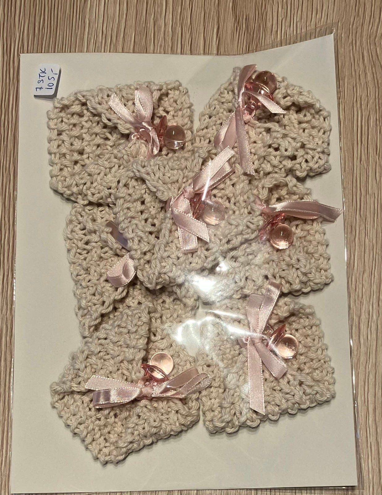 Nr 258 Strikket serviett ringer til baby 7pk | FINN-torget