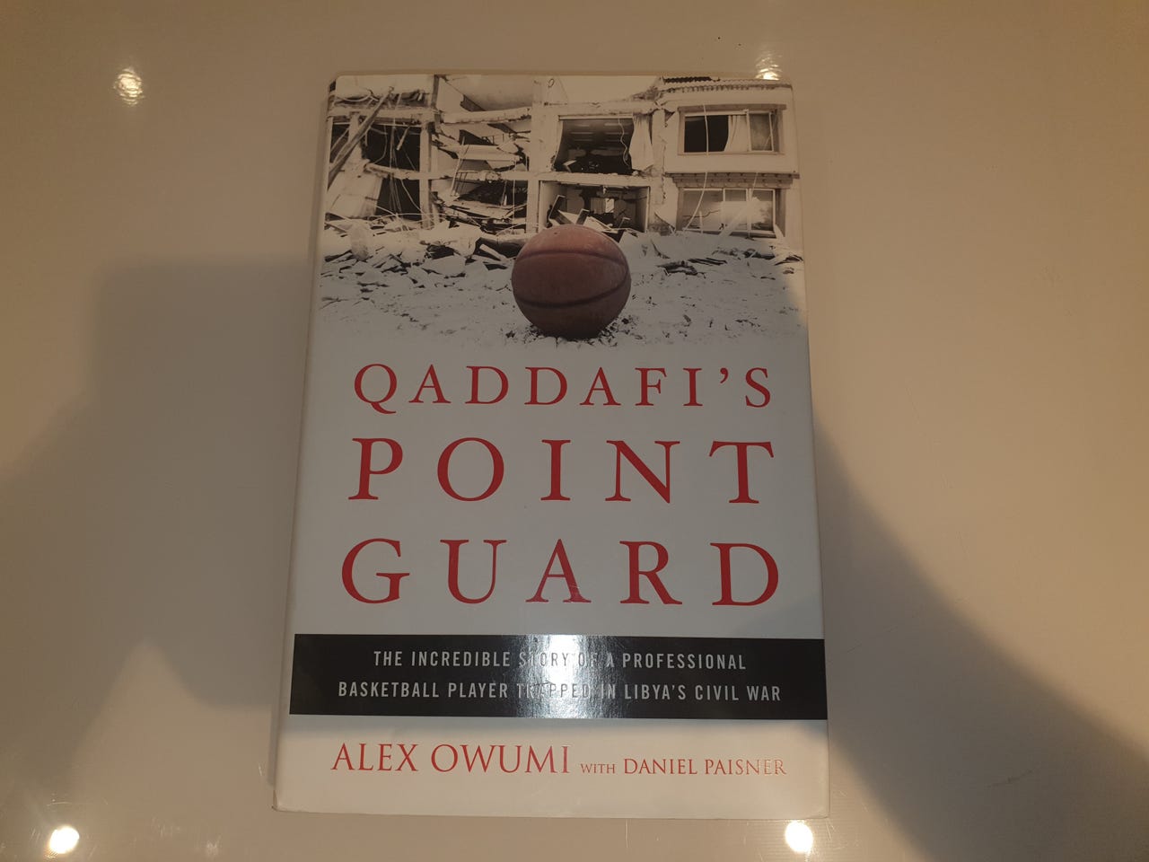 Qaddafi's Point Guard. Alex Owumi and Daniel Paisner | FINN-torget