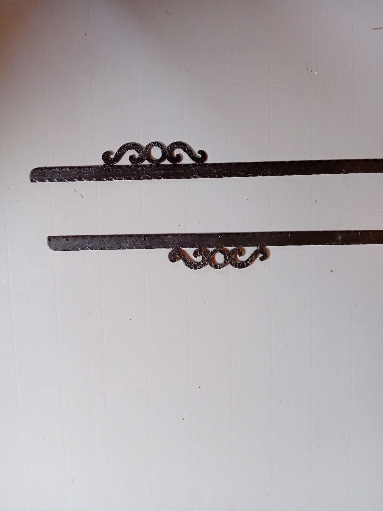 Oppheng til veggteppe i smijern | FINN-torget