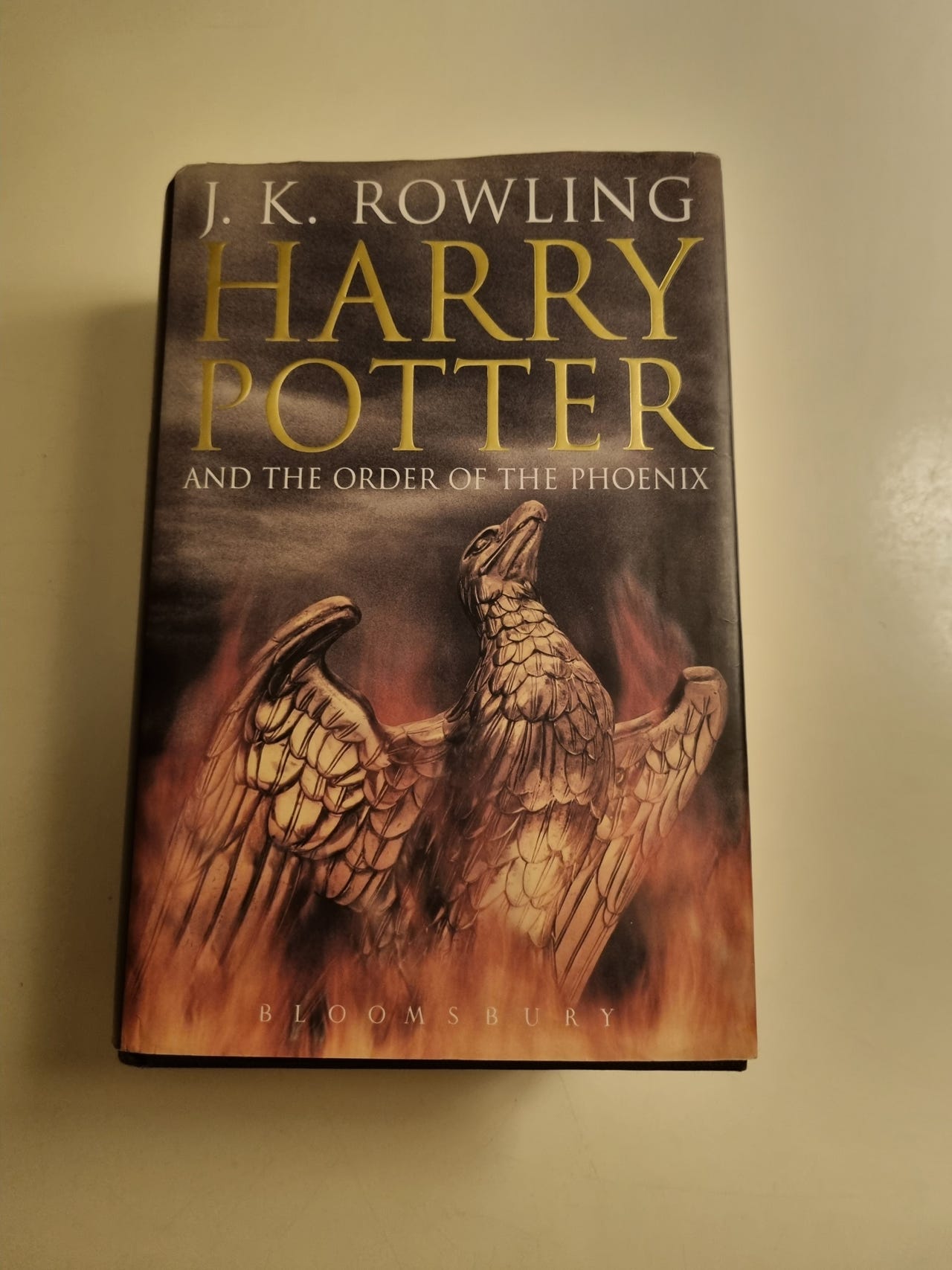 Harry Potter and the order of the Phoenix. Engelsk tekst. J. K. Rowling ...