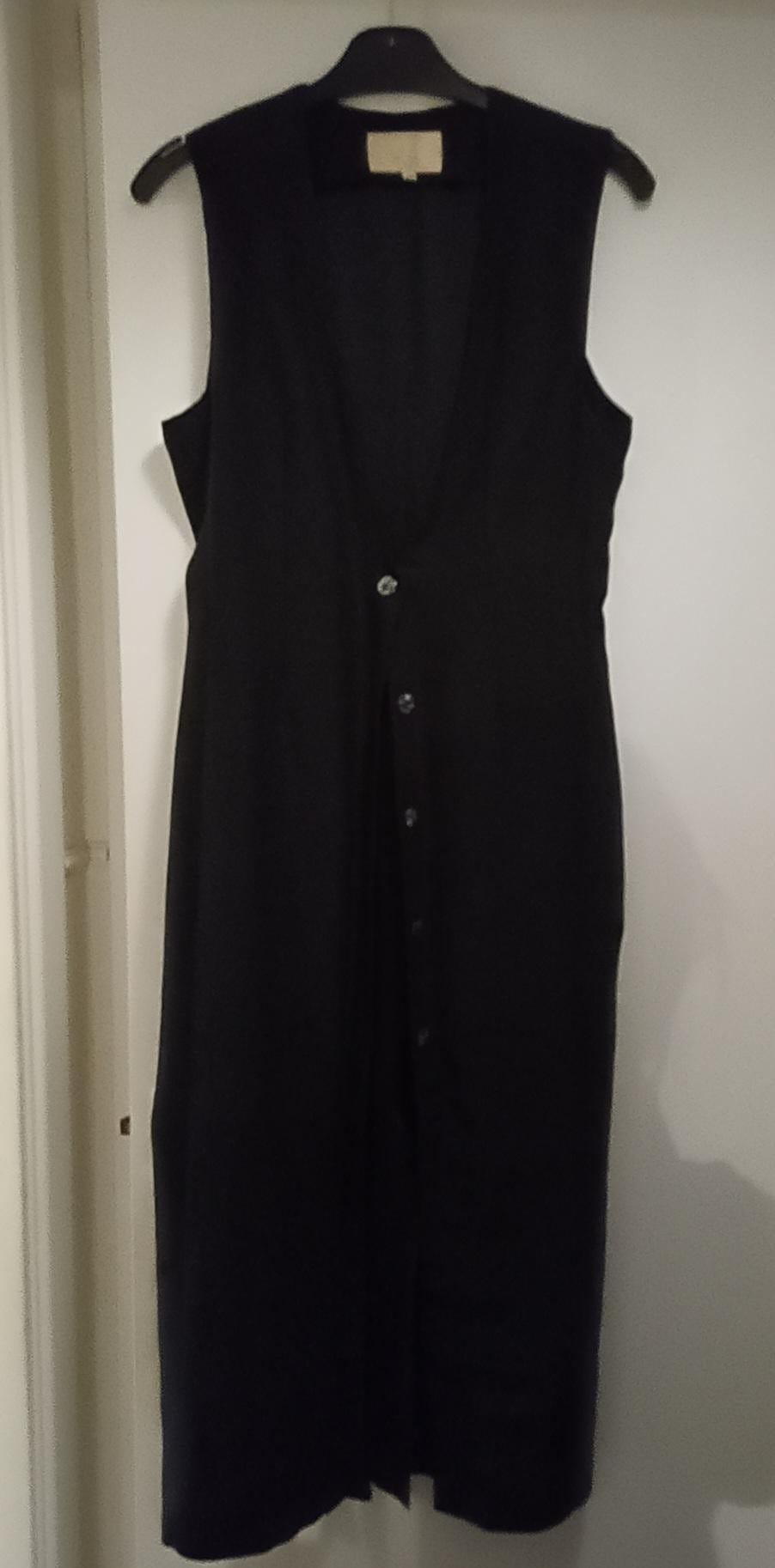 Lang, sort vest | FINN-torget