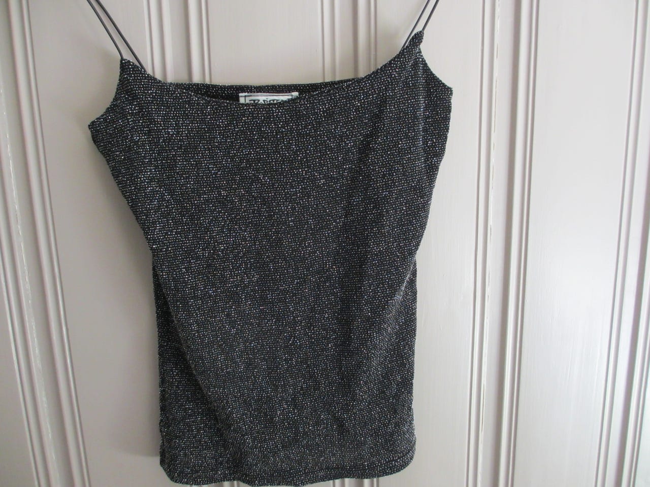 Selskapstopp i sort med sølvtråder | FINN-torget