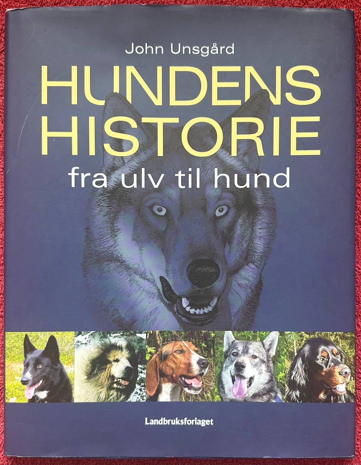 John Unsgård: Hundens historie; fra ulv til hund | FINN-torget