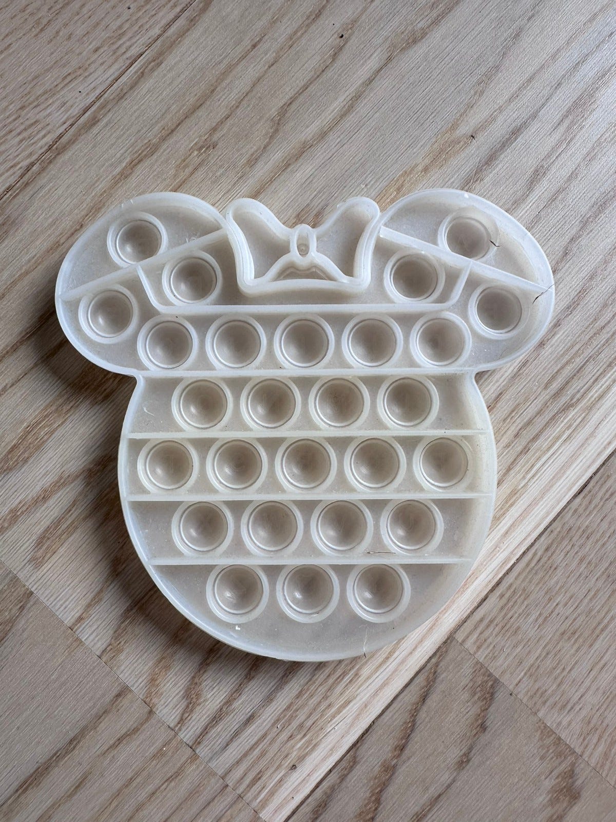 Disney Minnie Mouse Pop it med alfabetet | FINN-torget