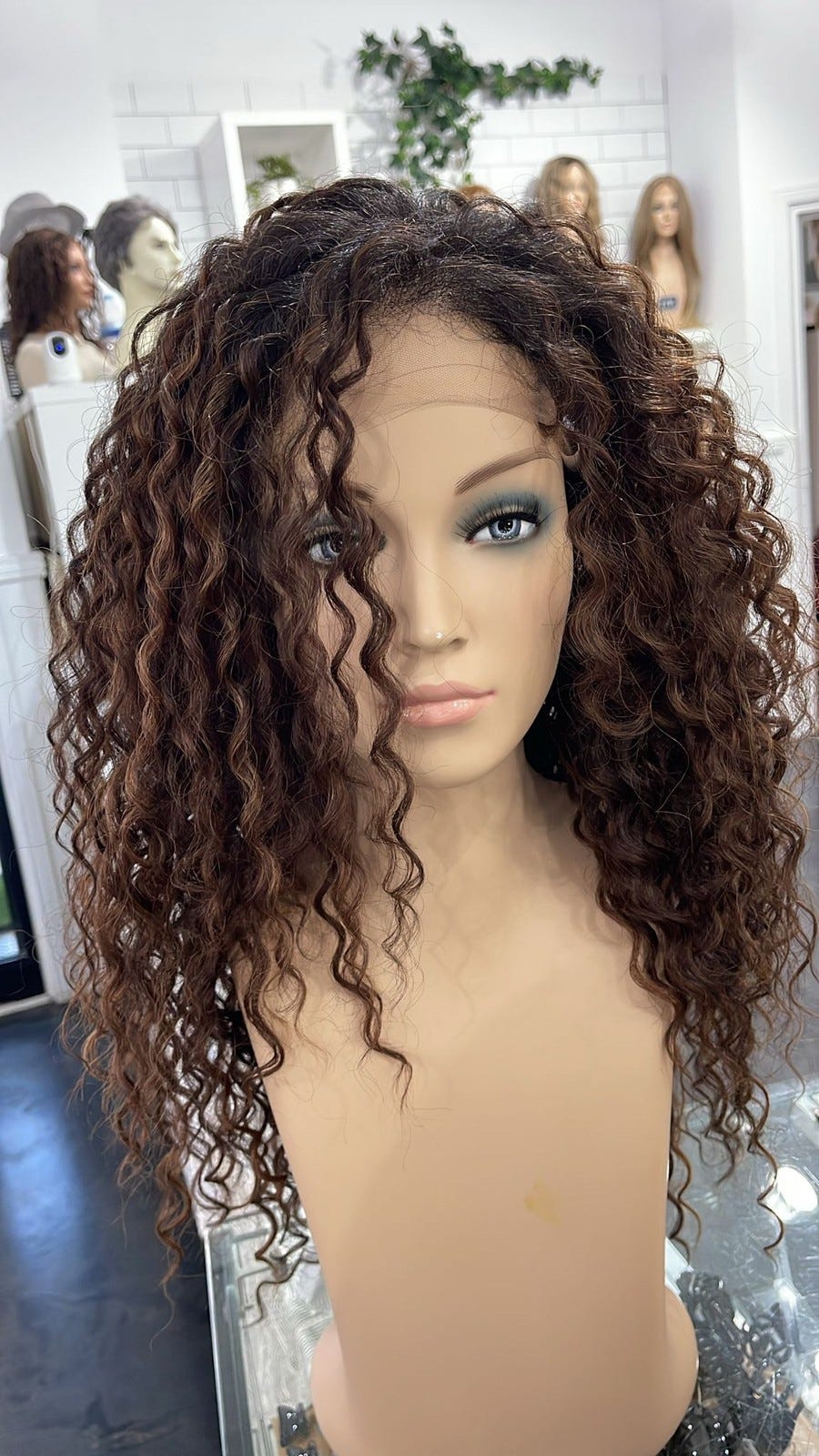 A heat resistant future fiber type of wig, curly hair with some slight ...