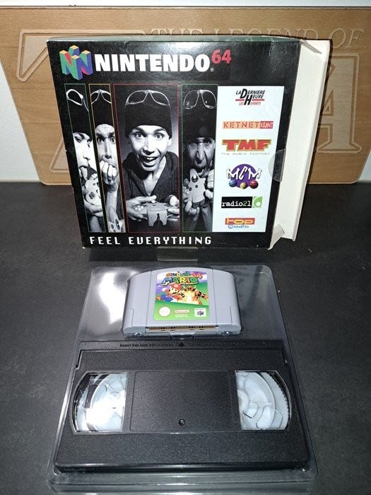 Nintendo - Pack Feel everything super mario 64 + vhs très rare ...