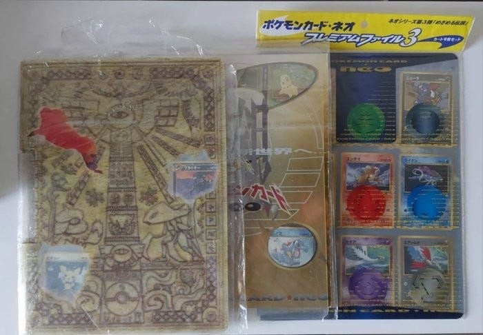 Pokémon - 3 Complete Album - neo genesis - Charizard, Entei, Lugia ...