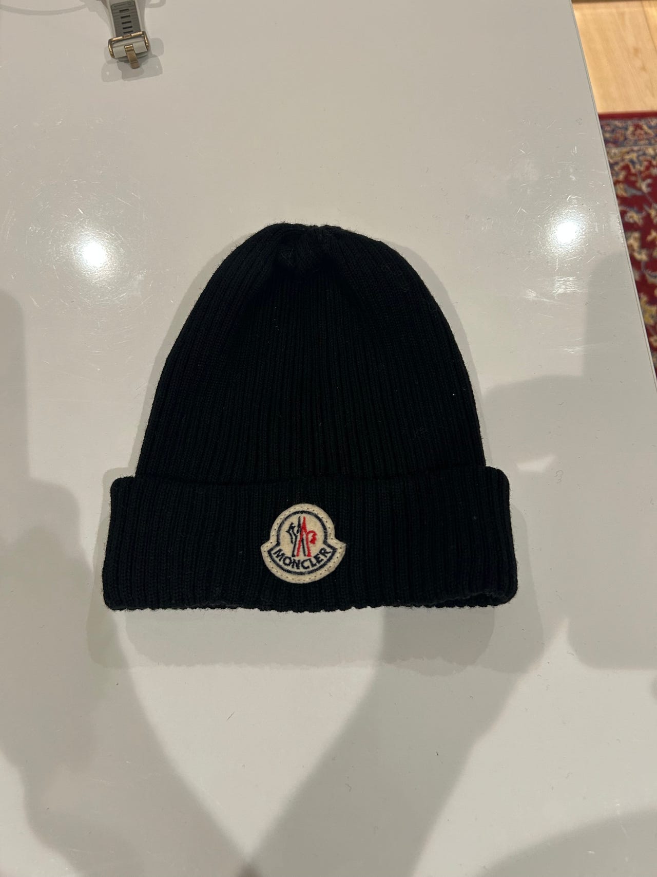 Svart Moncler lue | FINN-torget