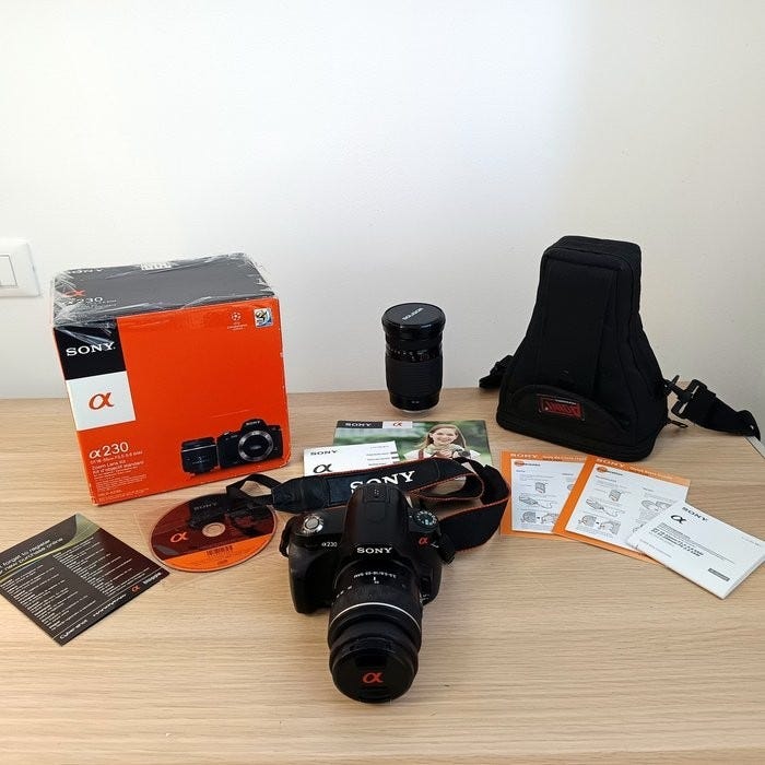 Sony A230 + Sony SAM 18-55 mm 3.5/5.6 + zoom 28-210 mm 3.5/5.6 ...