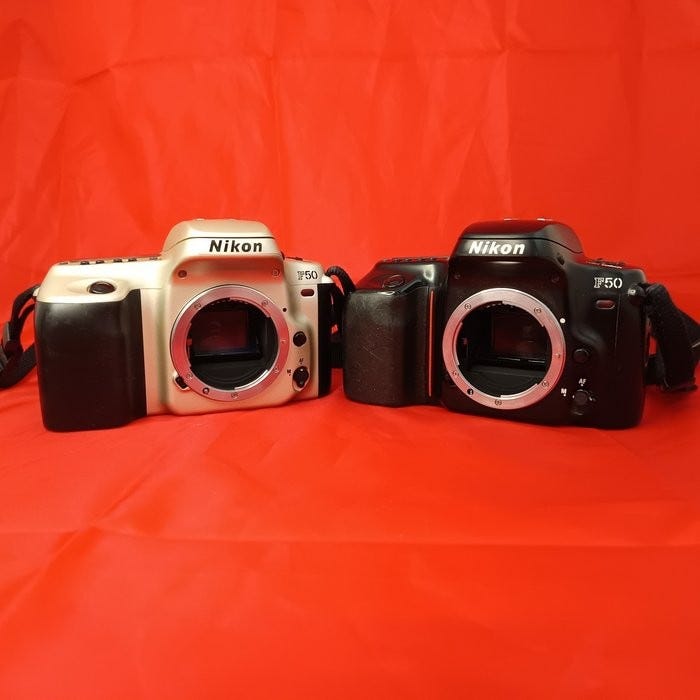 Nikon 2 F50 + manuali di istruzioni via pdf Et objektiv speilreflekskamera (SLR) | FINN-torget