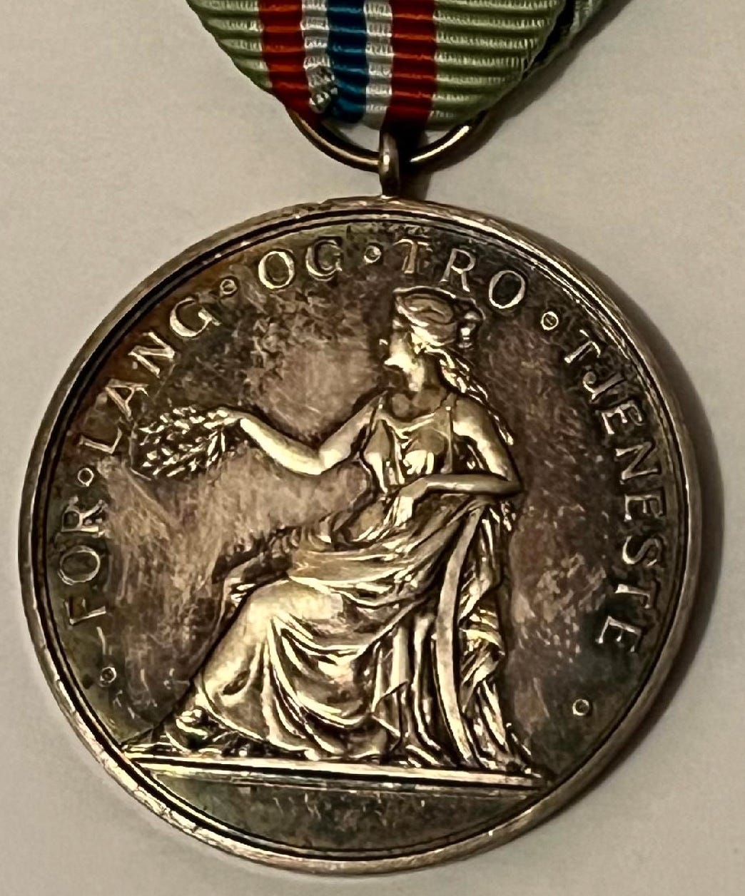 Norges vels medalje for lang og tro tjeneste i sølv | FINN-torget