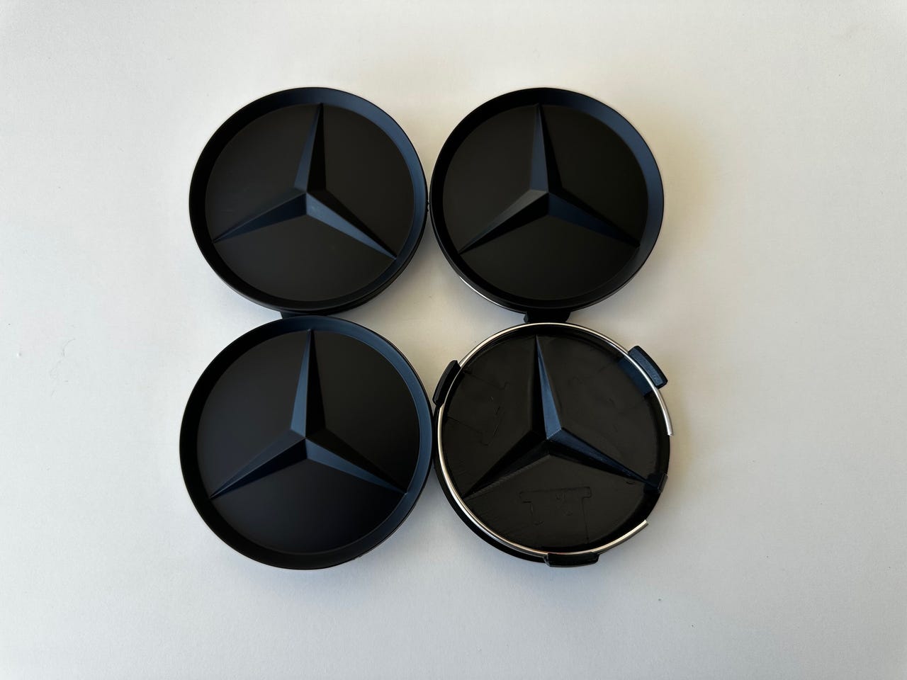 4stk nye Mercedes-Benz senterkopper 75mm svart matt | FINN-torget