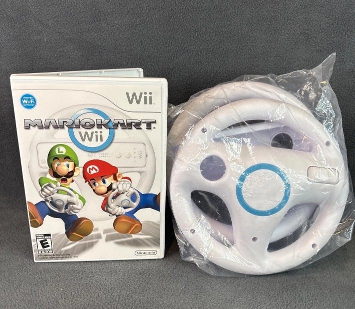 Mario kart med to ratt | Nintendo Wii | FINN-torget