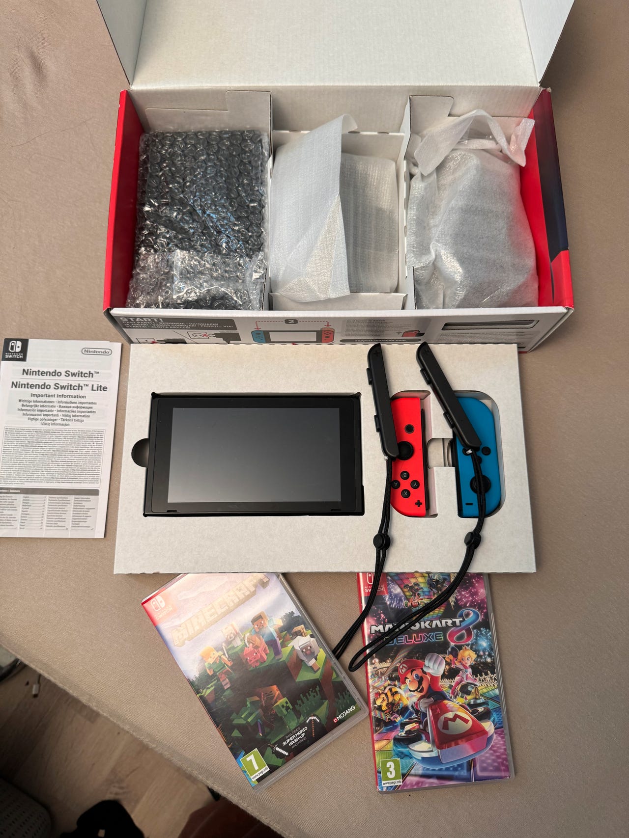 Nintendo switch med 2 spill | FINN-torget