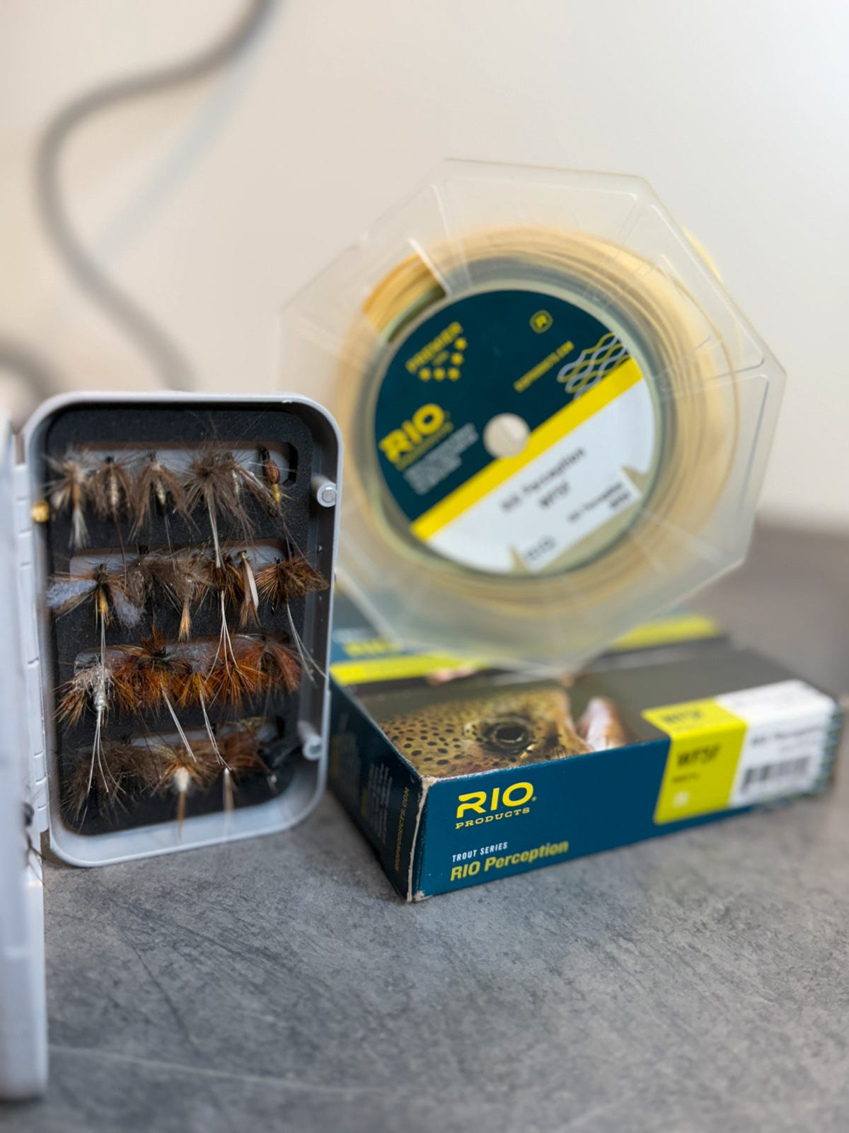 Rio Fluesnøre WF5F + 26 stk. finne øret fluer 🪰+ magnetic boxer | FINN ...