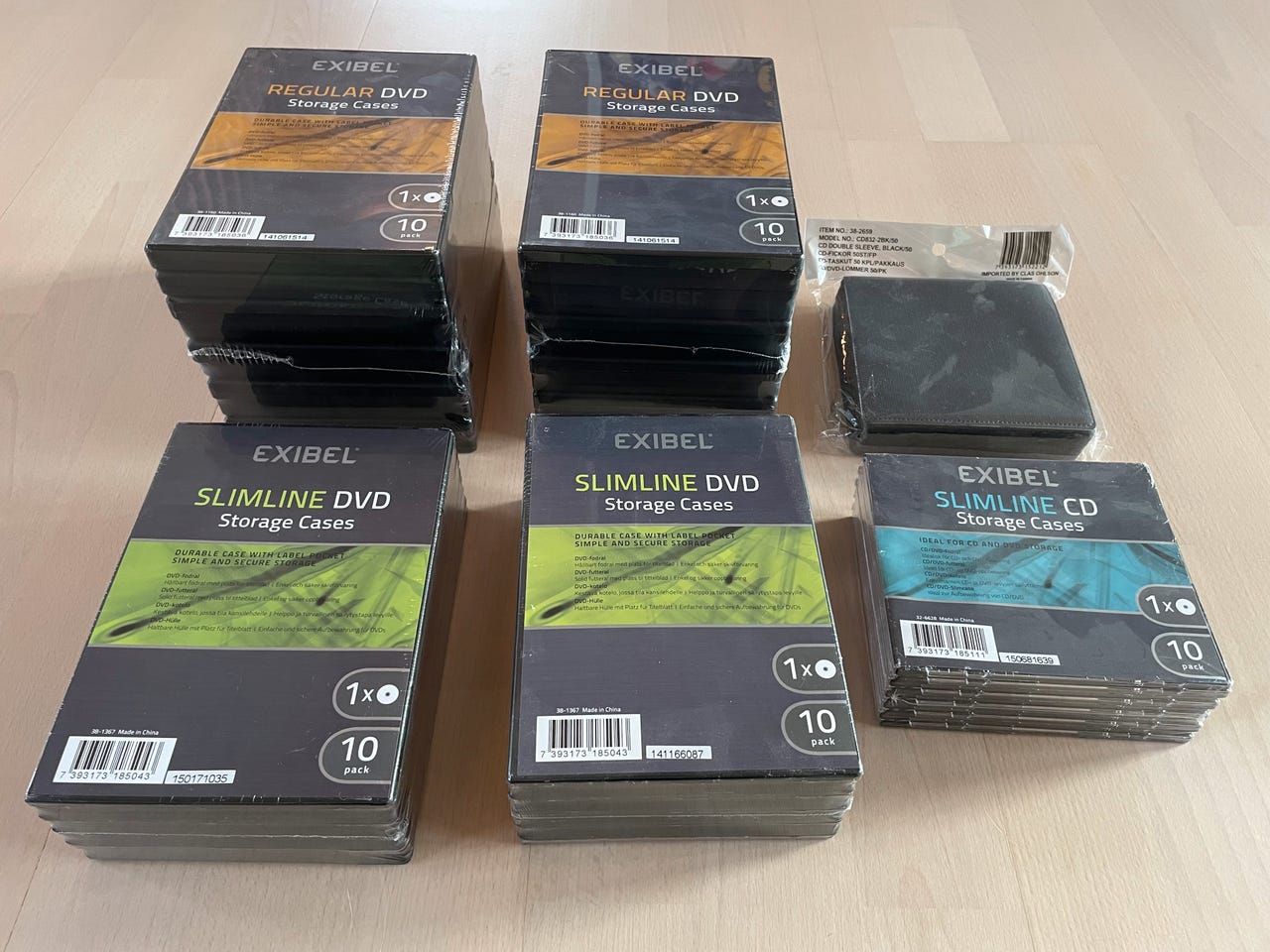 Div pakker Exibel CD/ DVD cover. Regular/ Slimline uåpnet i plast ...