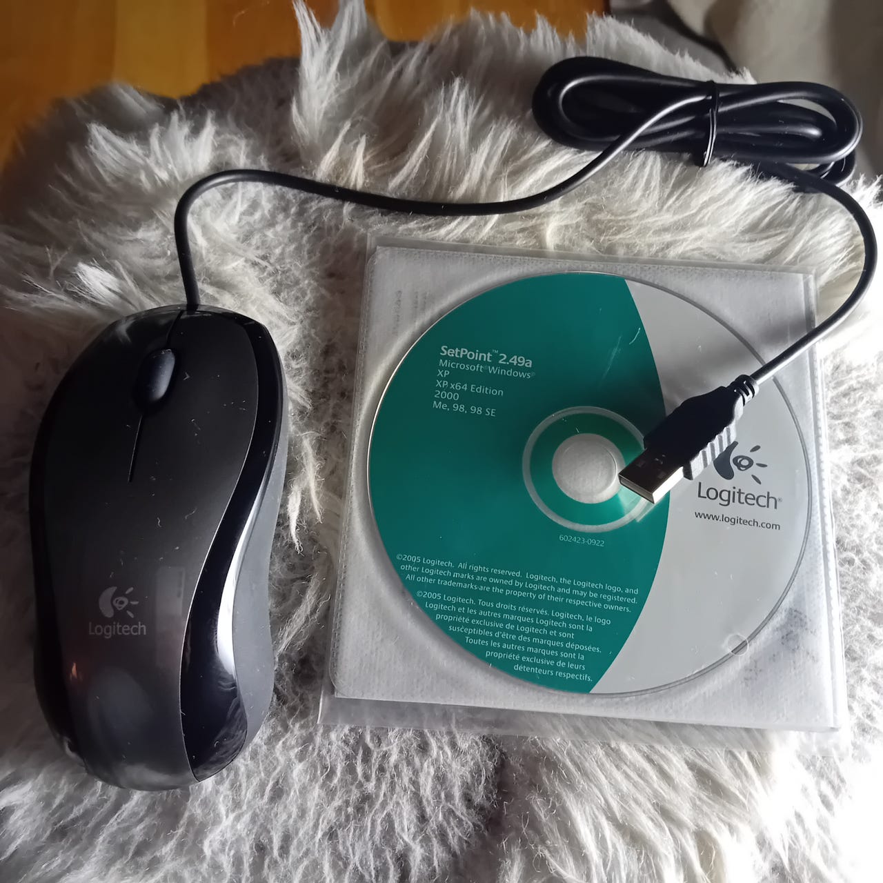 Ubrukt Logitech mus med uåpnet software | FINN-torget