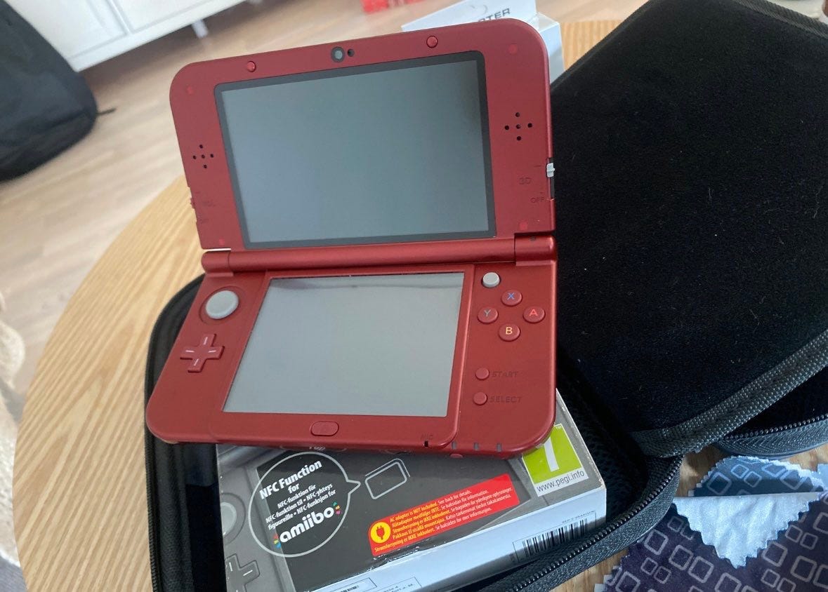 New Nintendo 3DS XL (USA) + 2 spill | FINN-torget