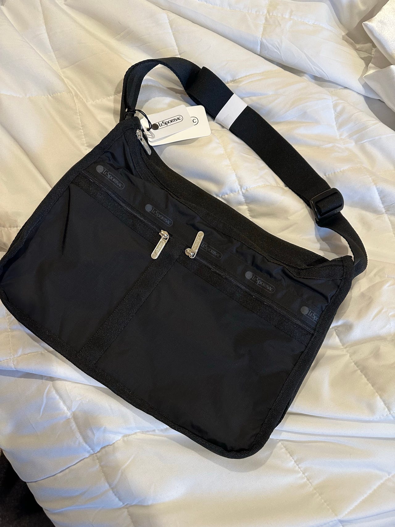 Samsonite skulderveske i stoff unisex svart | FINN-torget