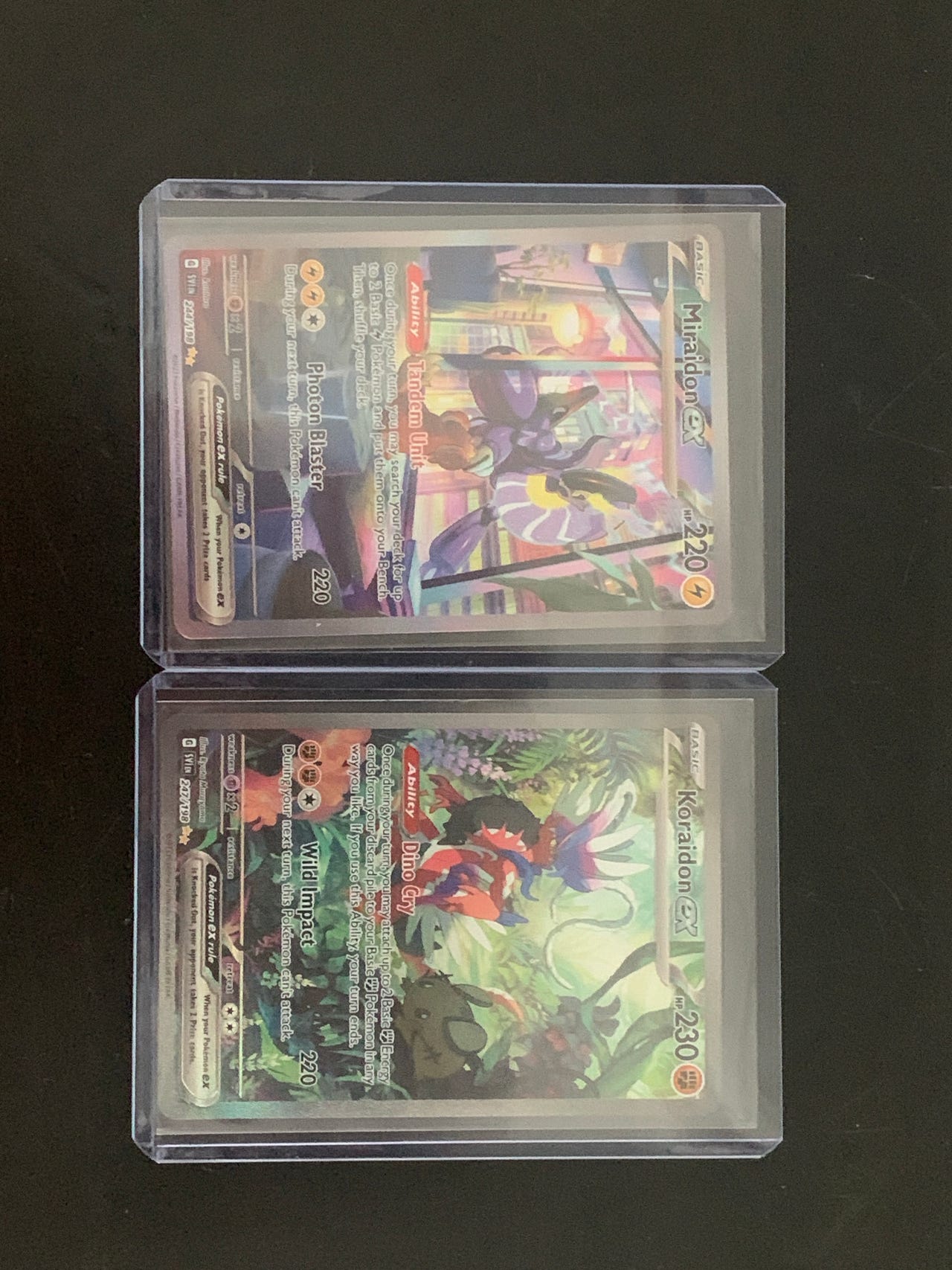 Miraidon og Koraidon ex SIR fra scarlet and violet base | FINN-torget