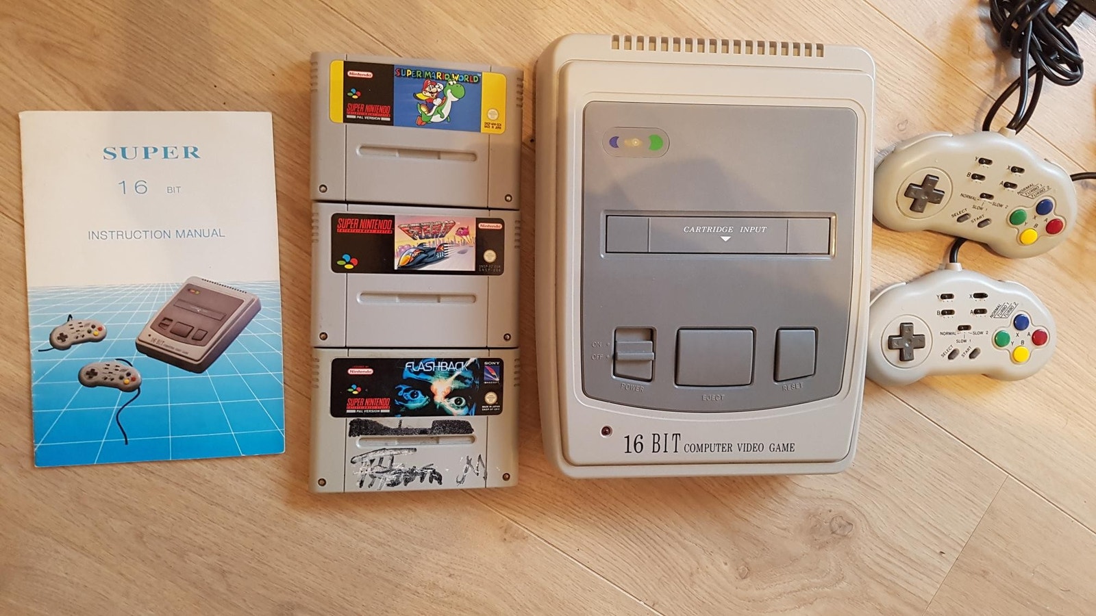 Picked up this clone SNES system at a garage sale, complete in box and ...