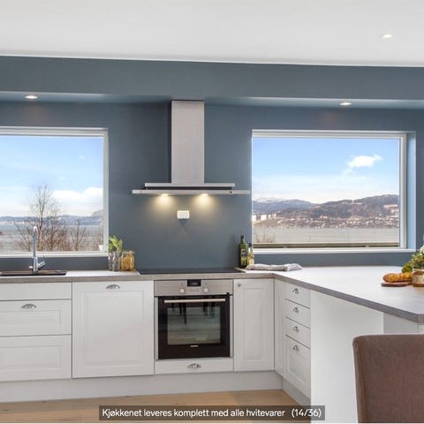 Moderne kjøkken med hvite fronter og grå benkeplate | FINN-torget